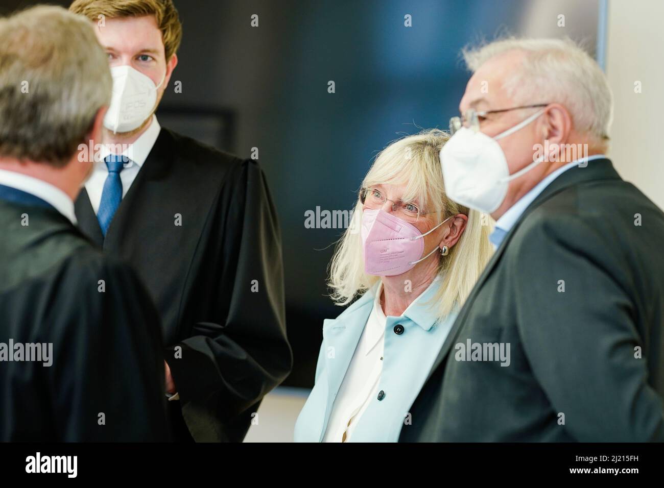 Her husband stands over her hi-res stock photography and images - Alamy