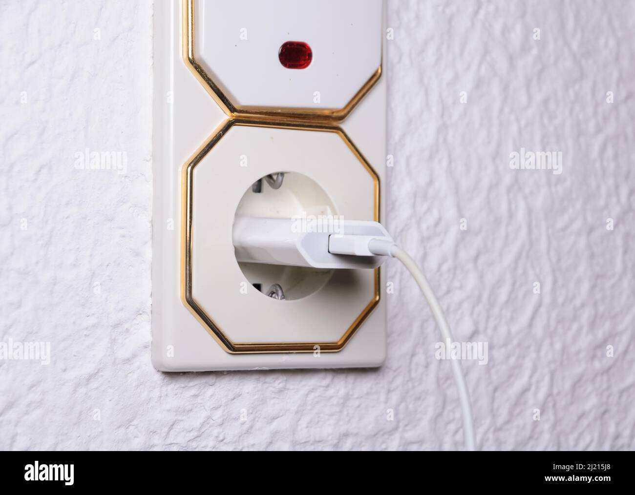 White plug in socket hi-res stock photography and images - Alamy