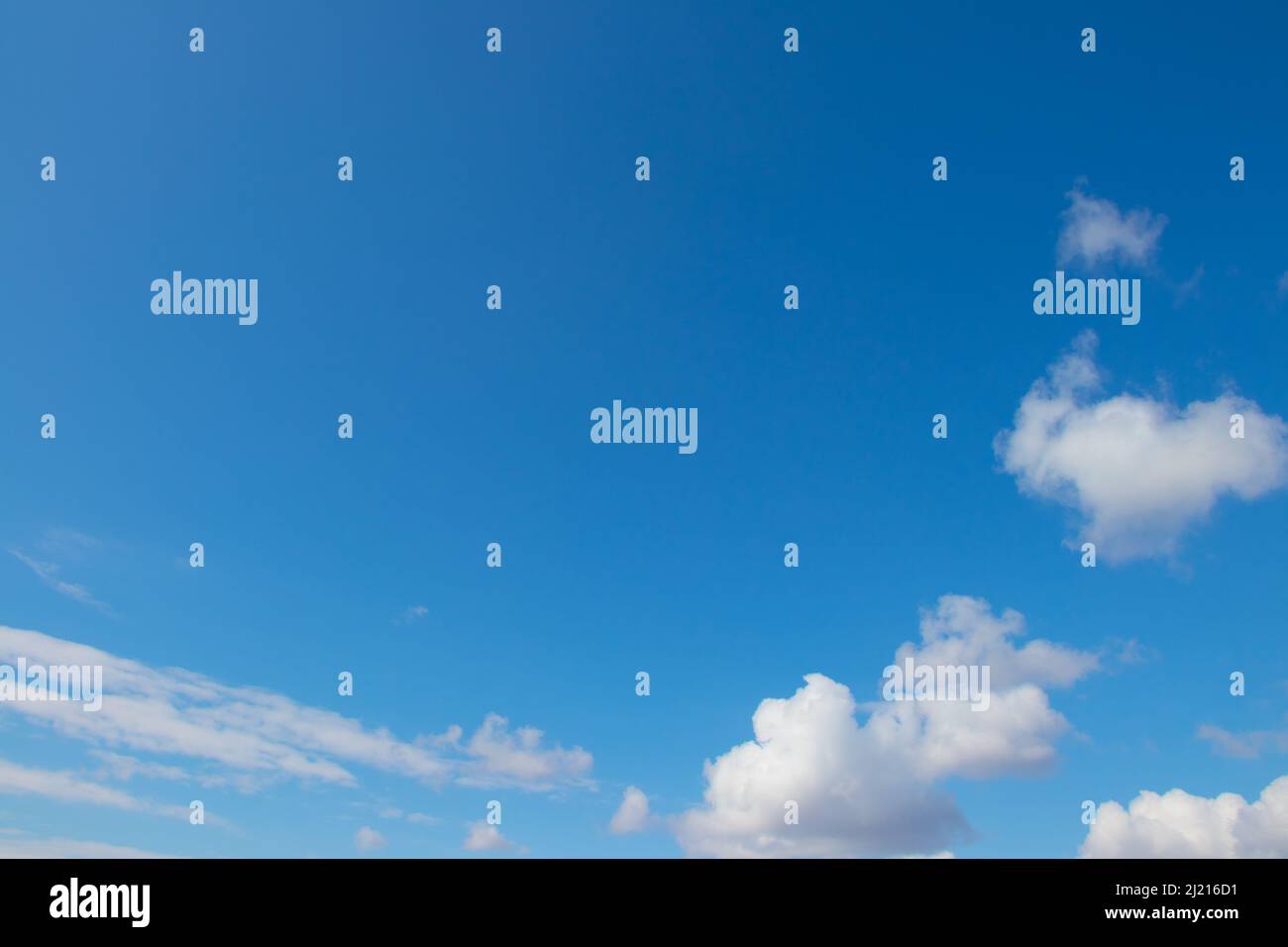 amazing blue background with light clouds Stock Photo - Alamy