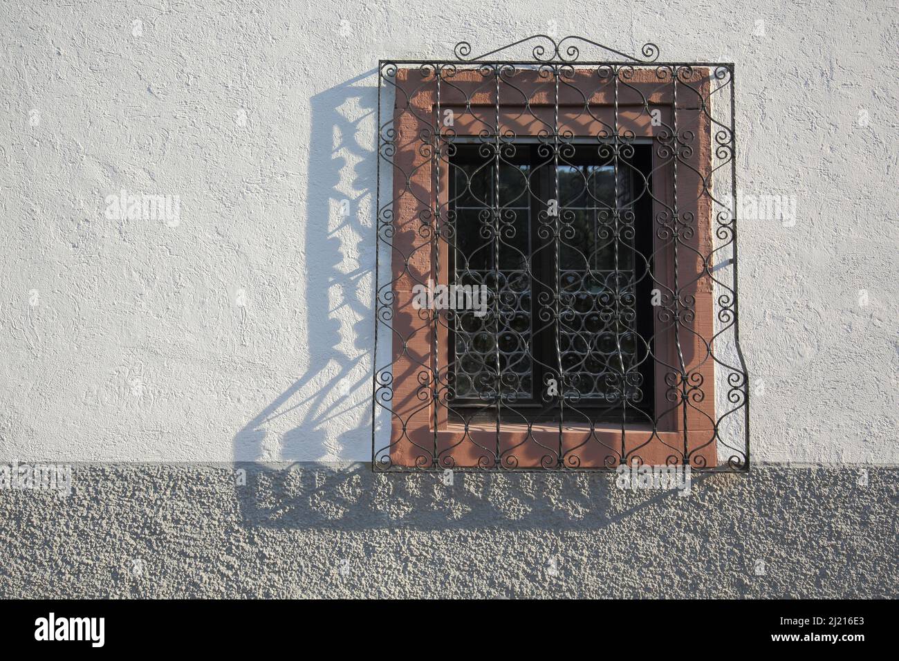 Window with metal grille in the old town in Heidelberg, Baden ...