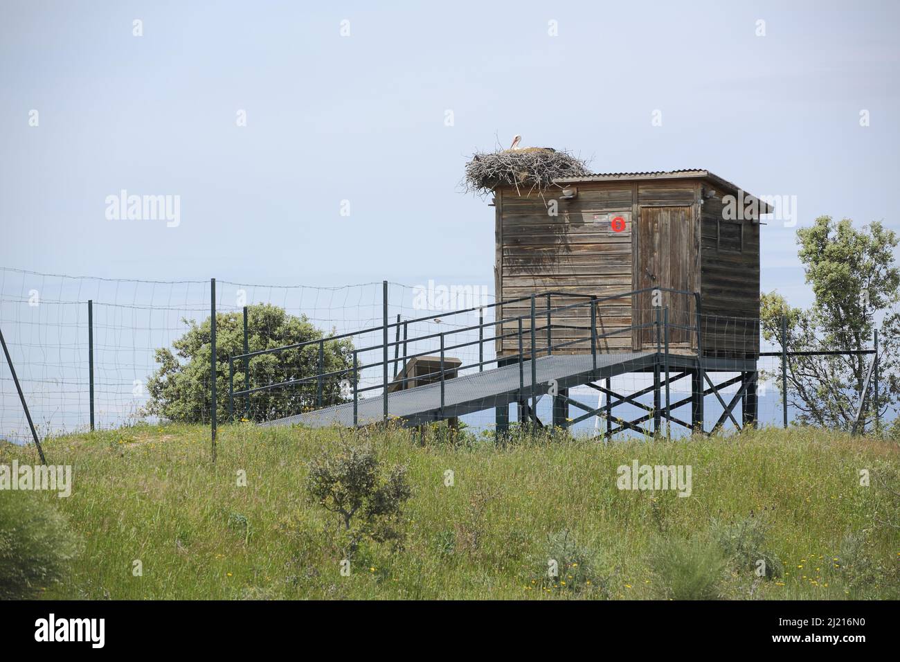 Observation hut with stork nest at Embalse de Almaraz-Arrocampo ...