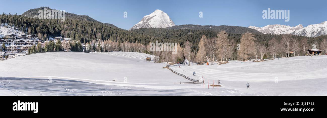 winter mountain landscape with woods, slopes and ski runs at ...