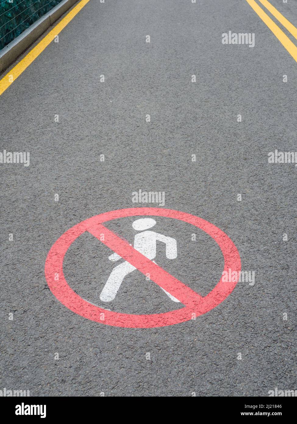 Signs drawn on the pavement Stock Photo - Alamy