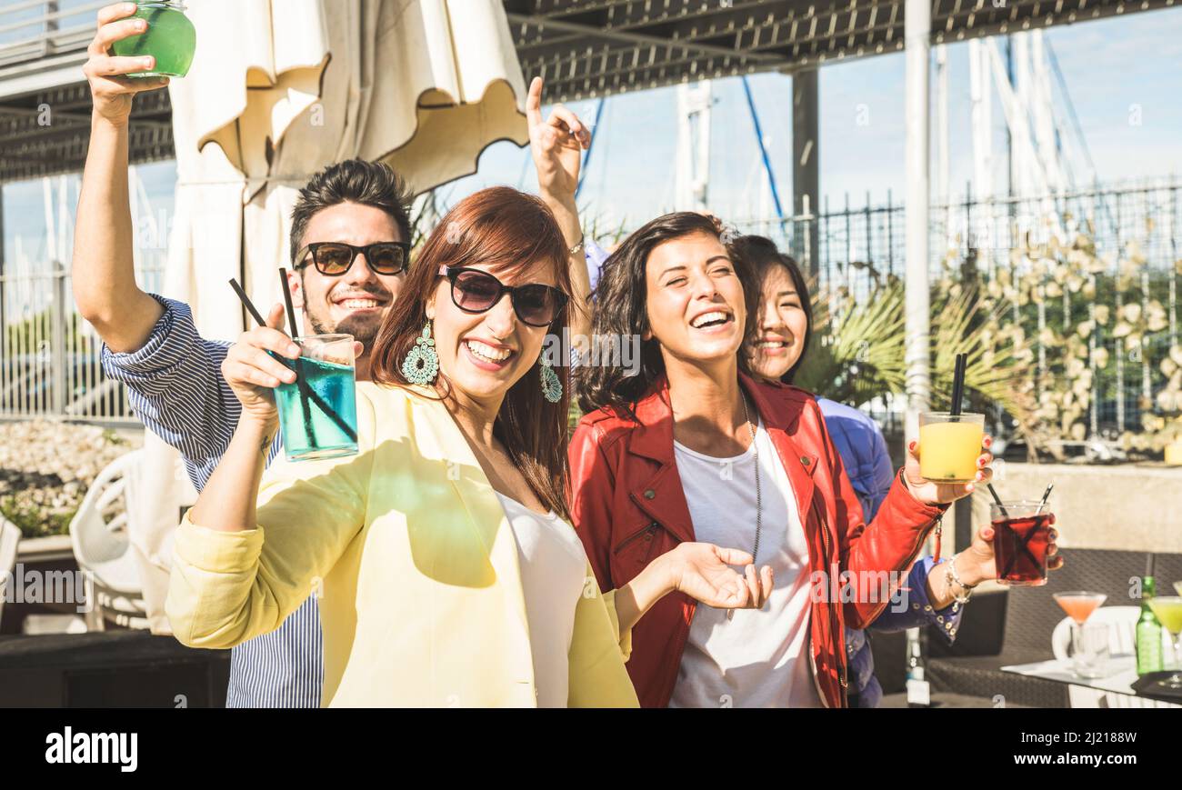 Fashion people dancing music and having fun together at beach party ...