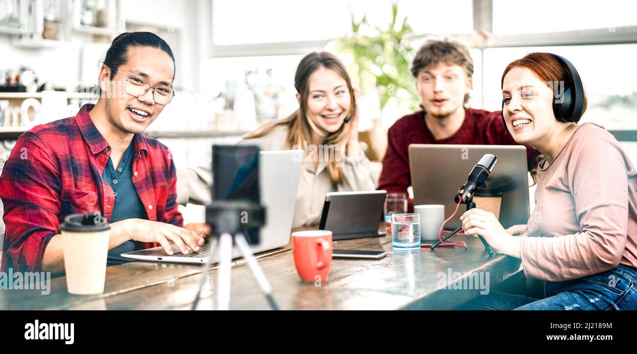 Happy students sharing content on streaming platforms with digital web ...