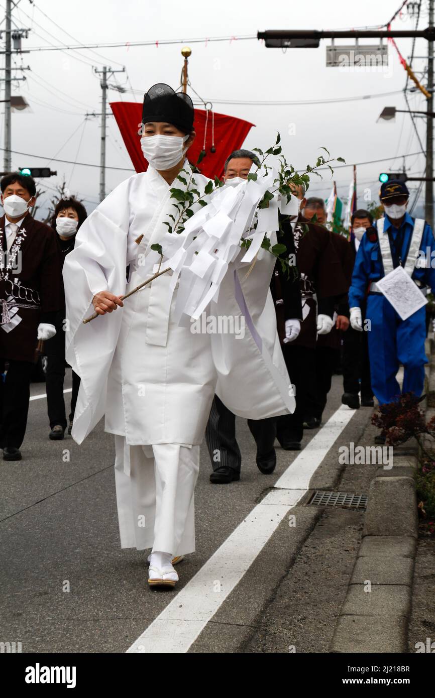 iida, nagano, japan, 2022/24/03, shintoist priests blessing the streets ...