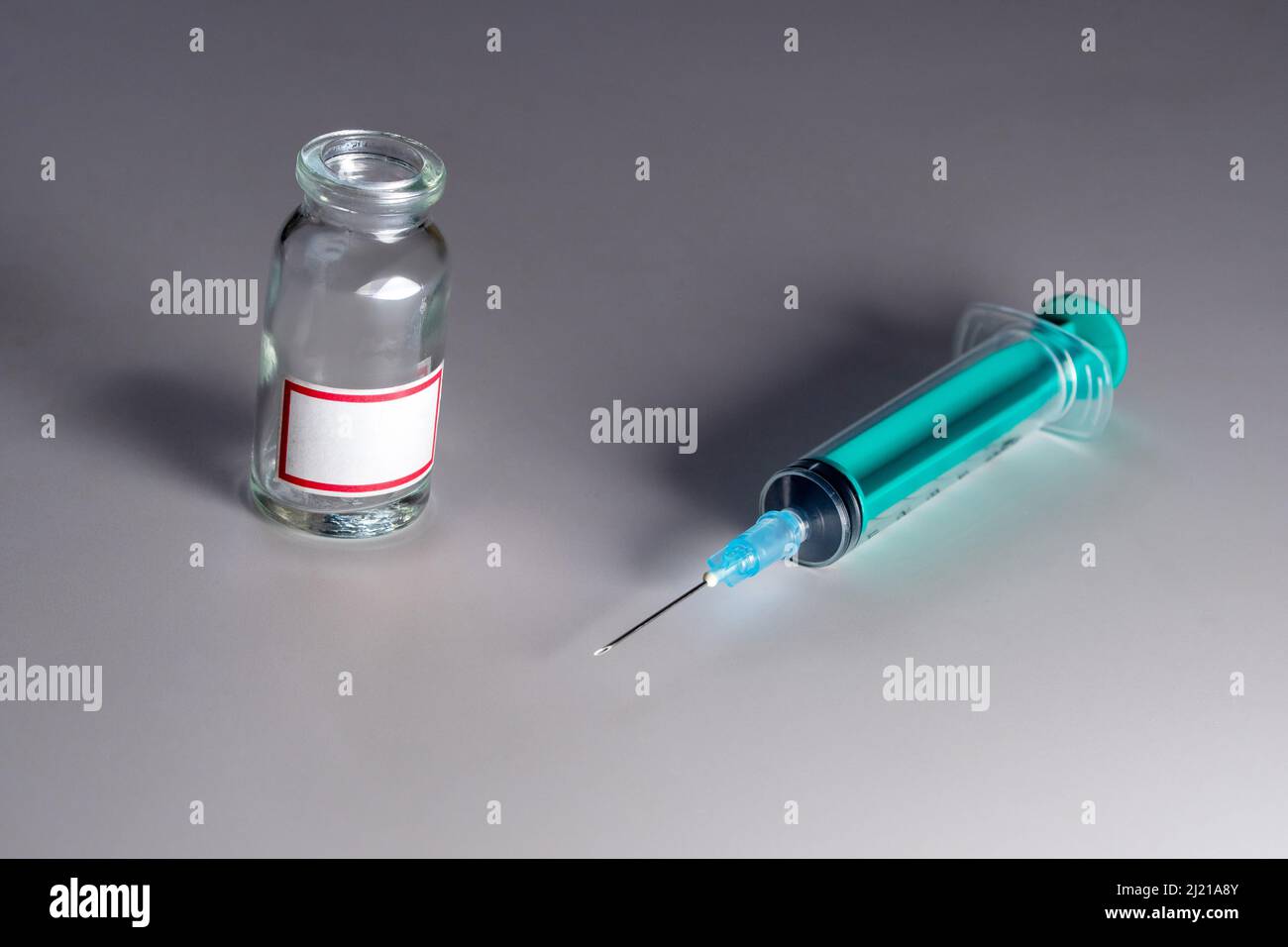 Urine sample bottle and clean syringe Stock Photo - Alamy
