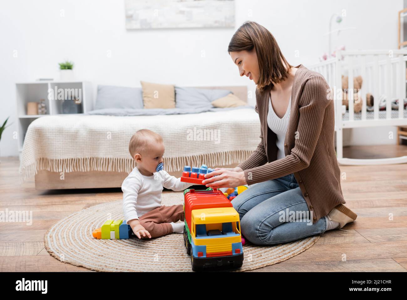 Baby boy with pacifier hi-res stock photography and images - Alamy