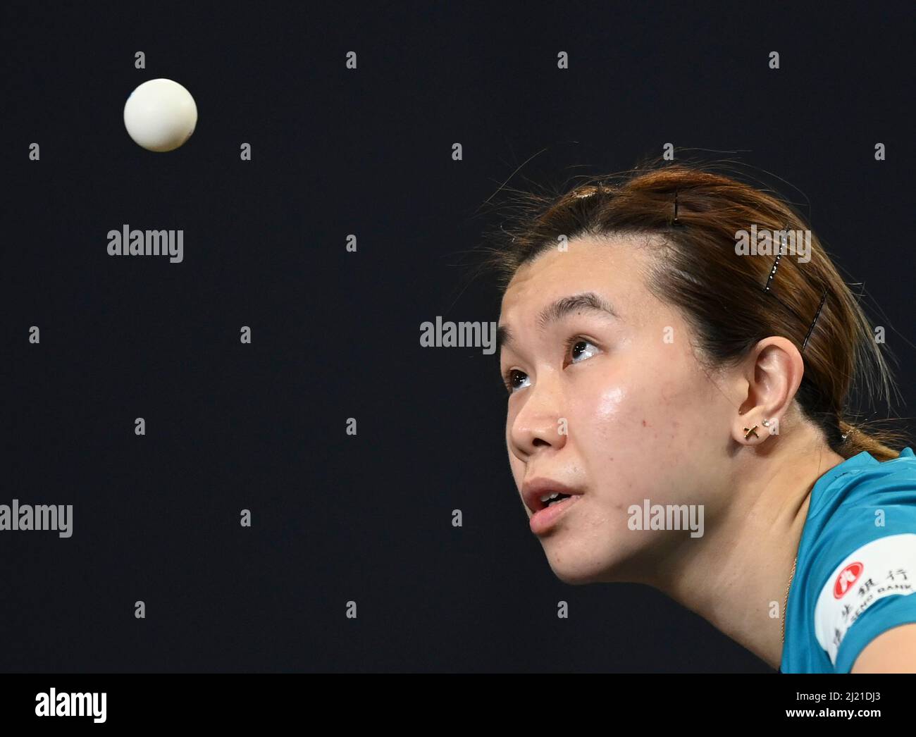 Doha, Qatar. 29th Mar, 2022. Lee Ho-Ching of China's Hong Kong serves ...