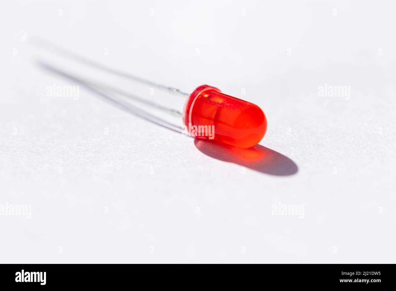 A studio portrait of a single red color LED or colored Light Emitting ...
