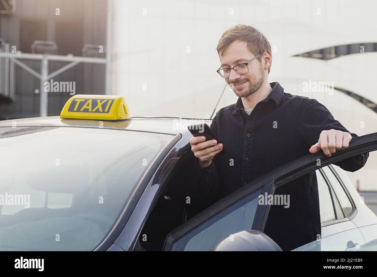 Standing smiling car transportation hi-res stock photography and images ...
