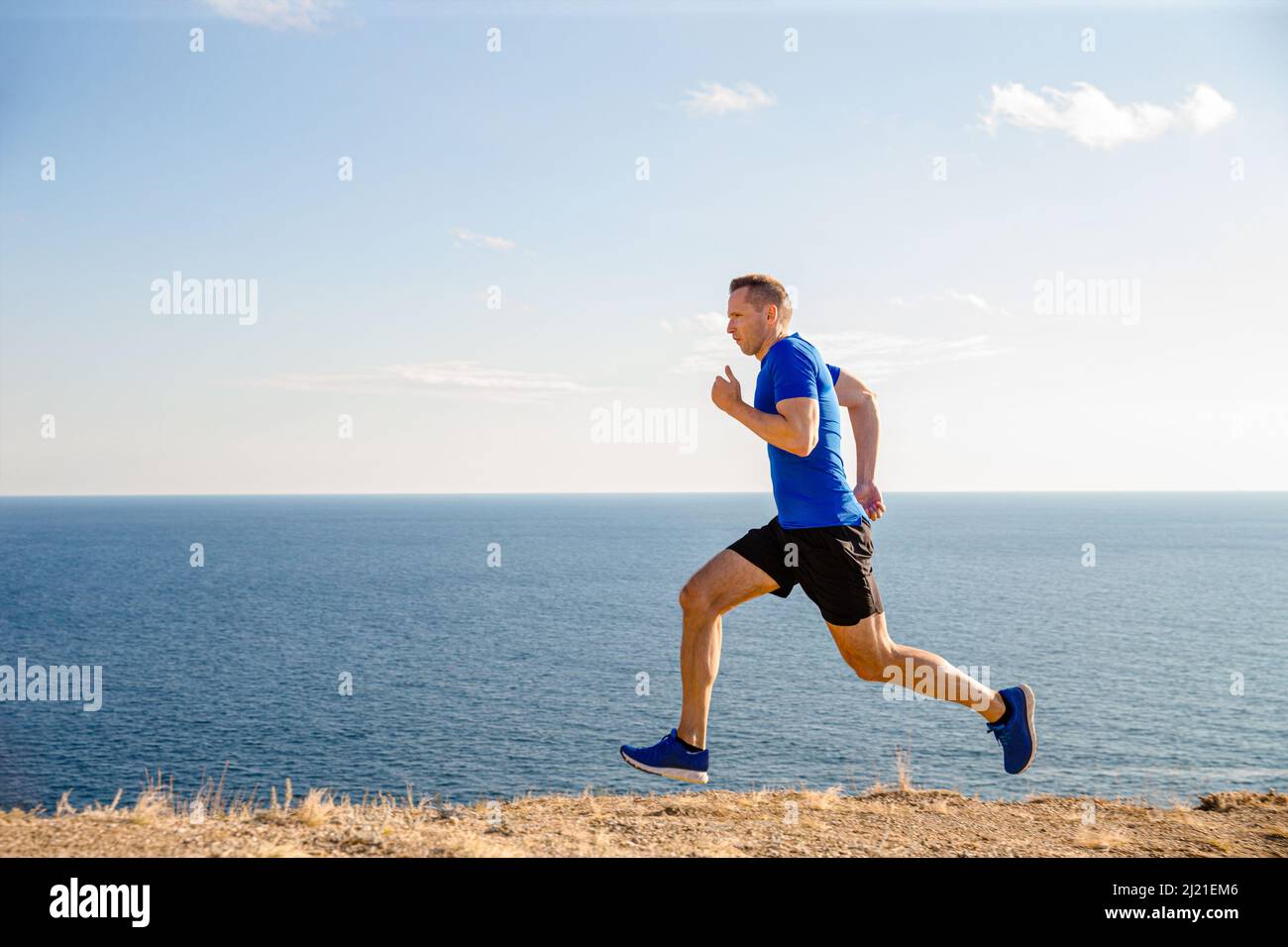 Male athlete runner training hi-res stock photography and images - Alamy
