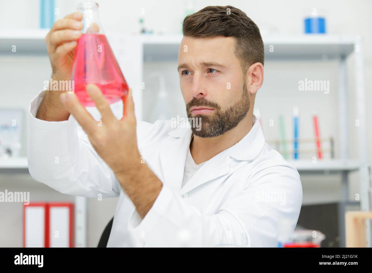 Human face in red liquid hi-res stock photography and images - Alamy