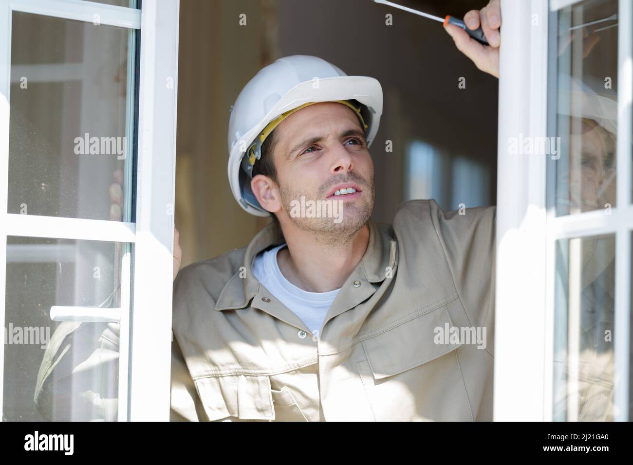 installation and repair of windows Stock Photo - Alamy