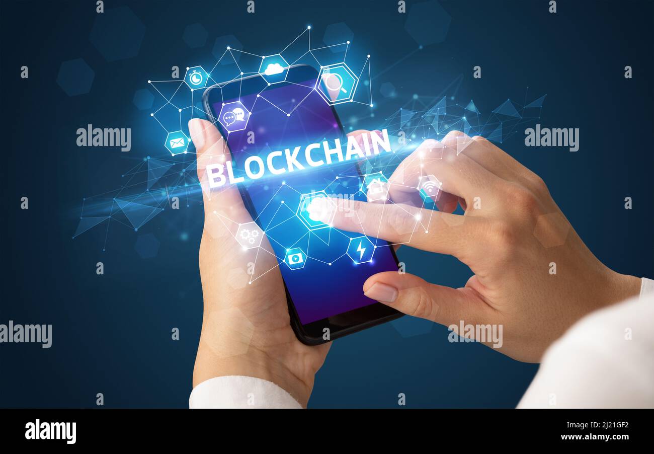 Hand using smartphone with technology concept Stock Photo - Alamy