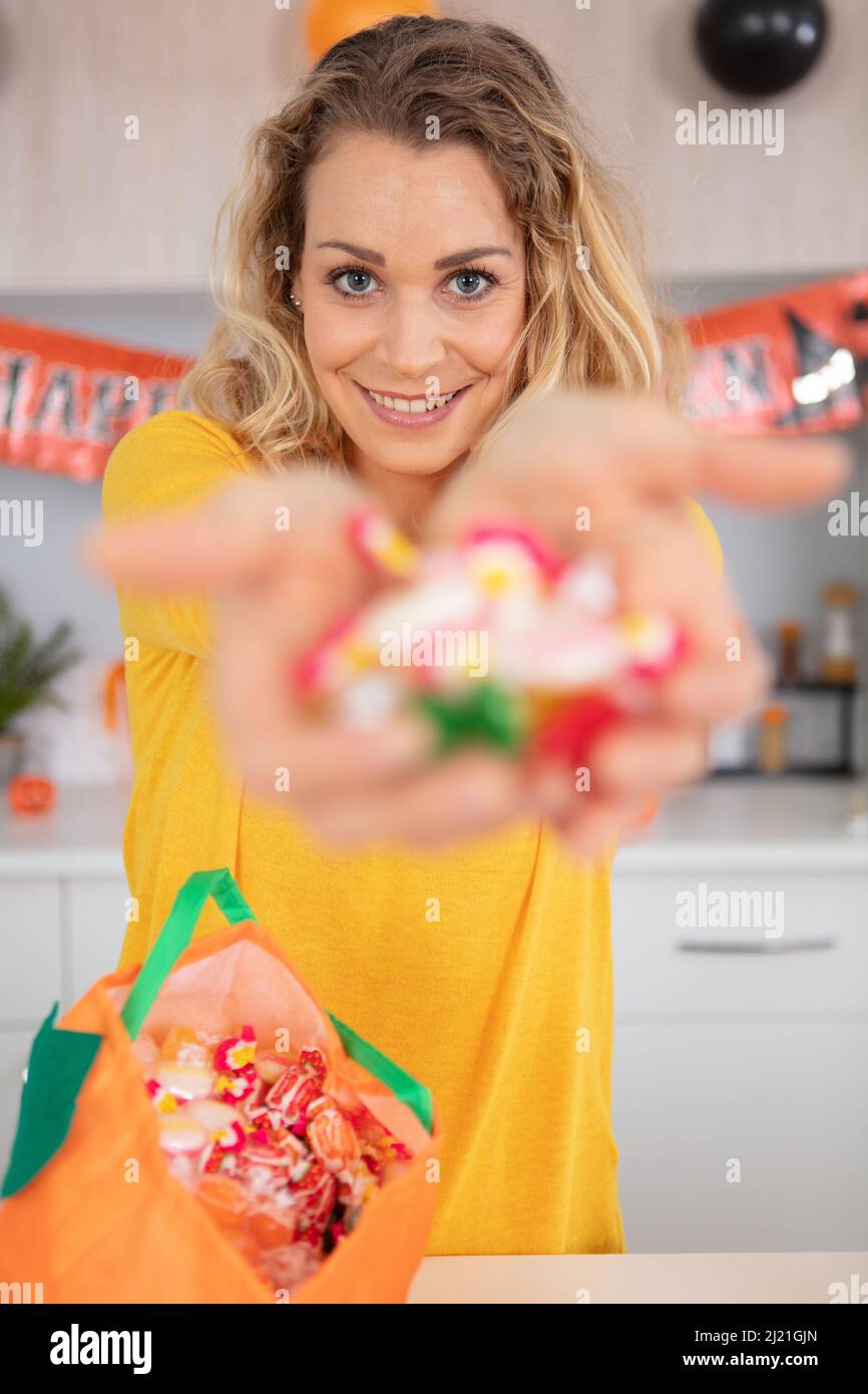 woman eating sweets with a fresh smile Stock Photo - Alamy