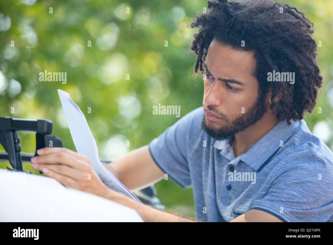 young man getting ready for vacations Stock Photo - Alamy