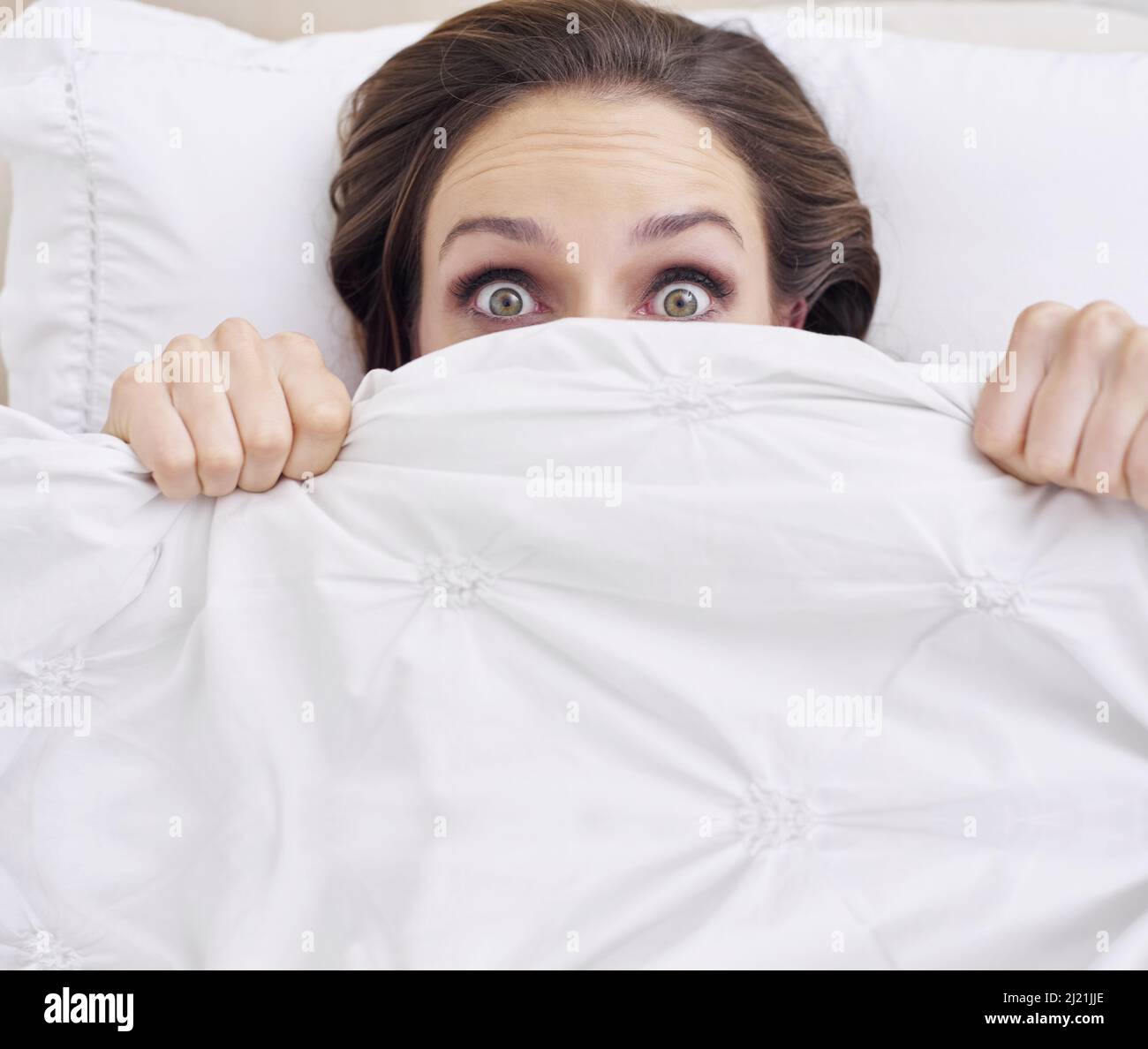 Peeking out from under the bed hi-res stock photography and images - Alamy