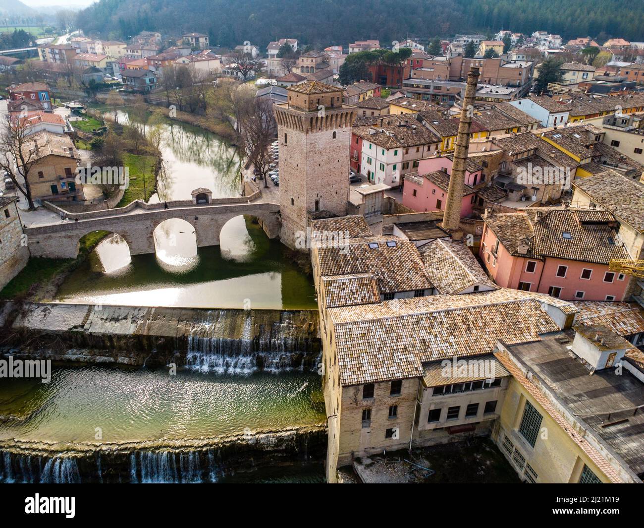 Fermignano tower and waterfall in Italy Stock Photo - Alamy