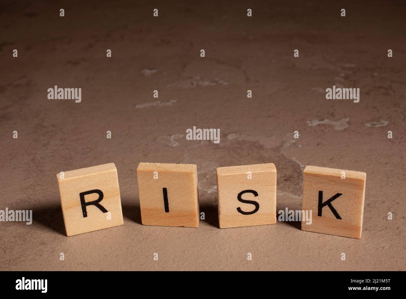 Risk Word on Wooden Tile Block Stock Photo - Alamy