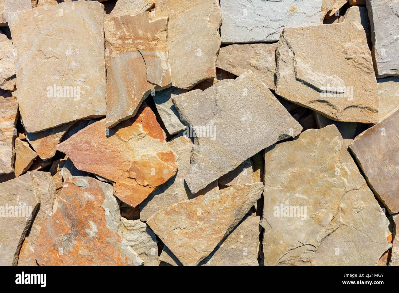 Texture and pieces of shale sandstone against the backdrop of bright ...