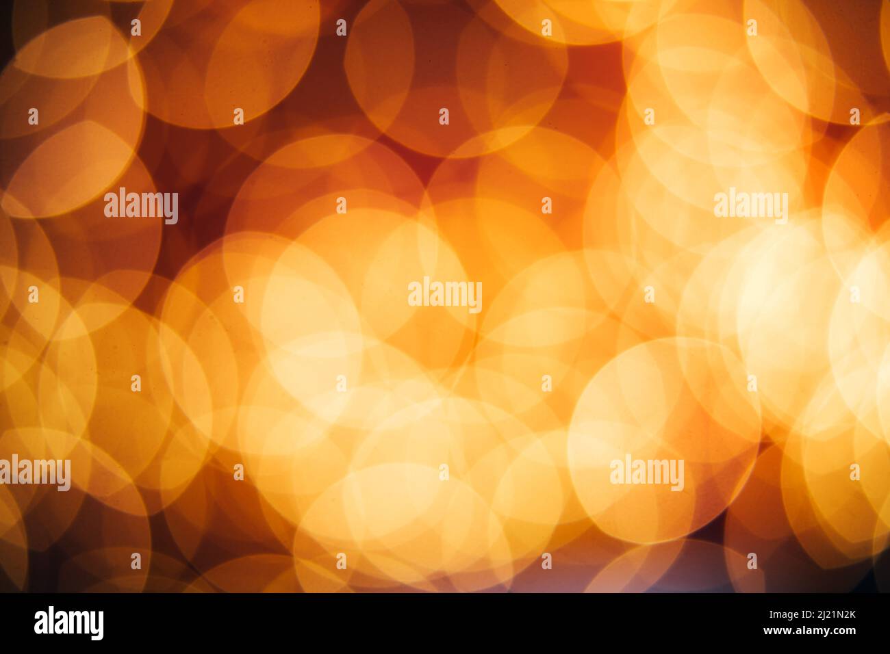 Vivid and dramatic abstract orange natural bokeh background with copy ...