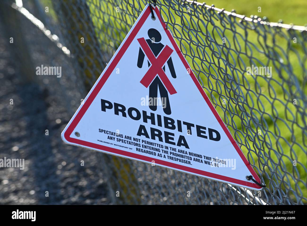 Prohibited area warning sign on a security fence Stock Photo - Alamy
