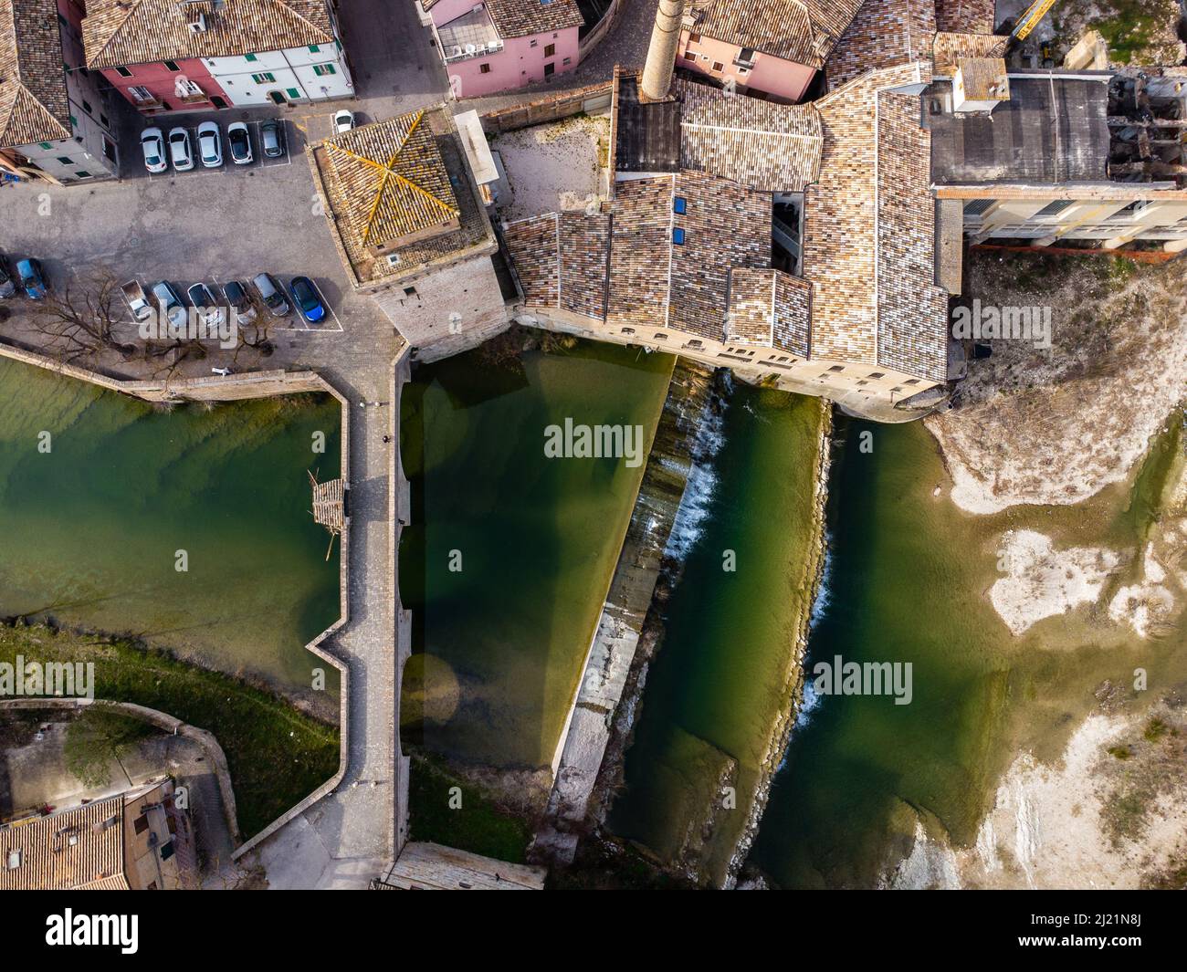 Fermignano tower and waterfall in Italy Stock Photo - Alamy
