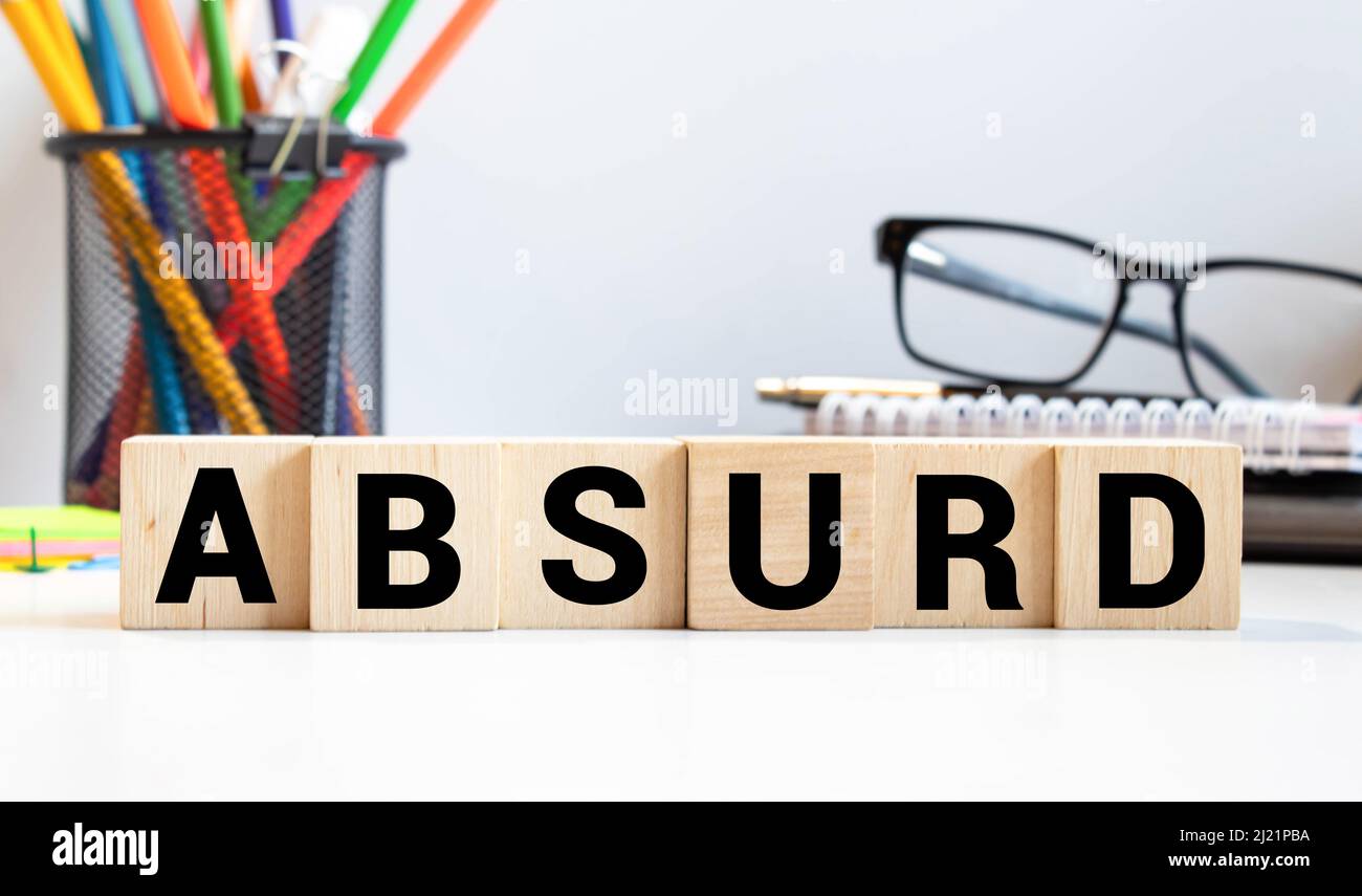 ABSURD word made with building blocks, concept Stock Photo - Alamy