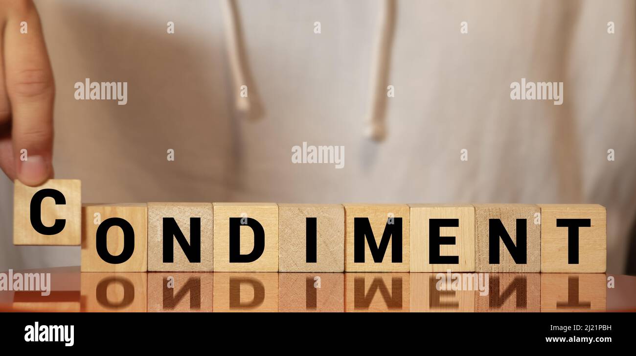 CONDIMENT word made with building blocks. concept Stock Photo - Alamy