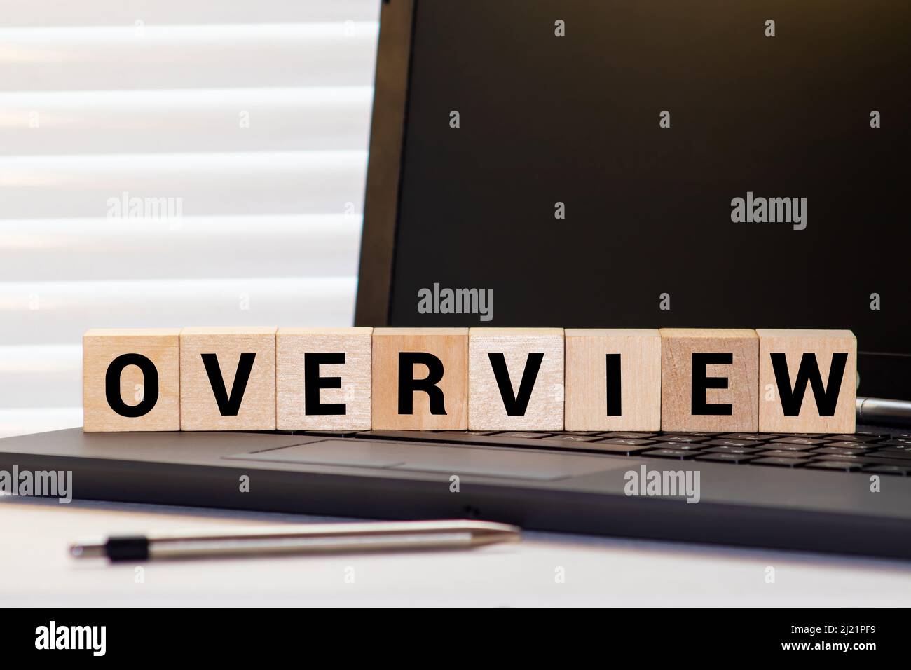 OVERVIEW word on block concept, business concept Stock Photo - Alamy