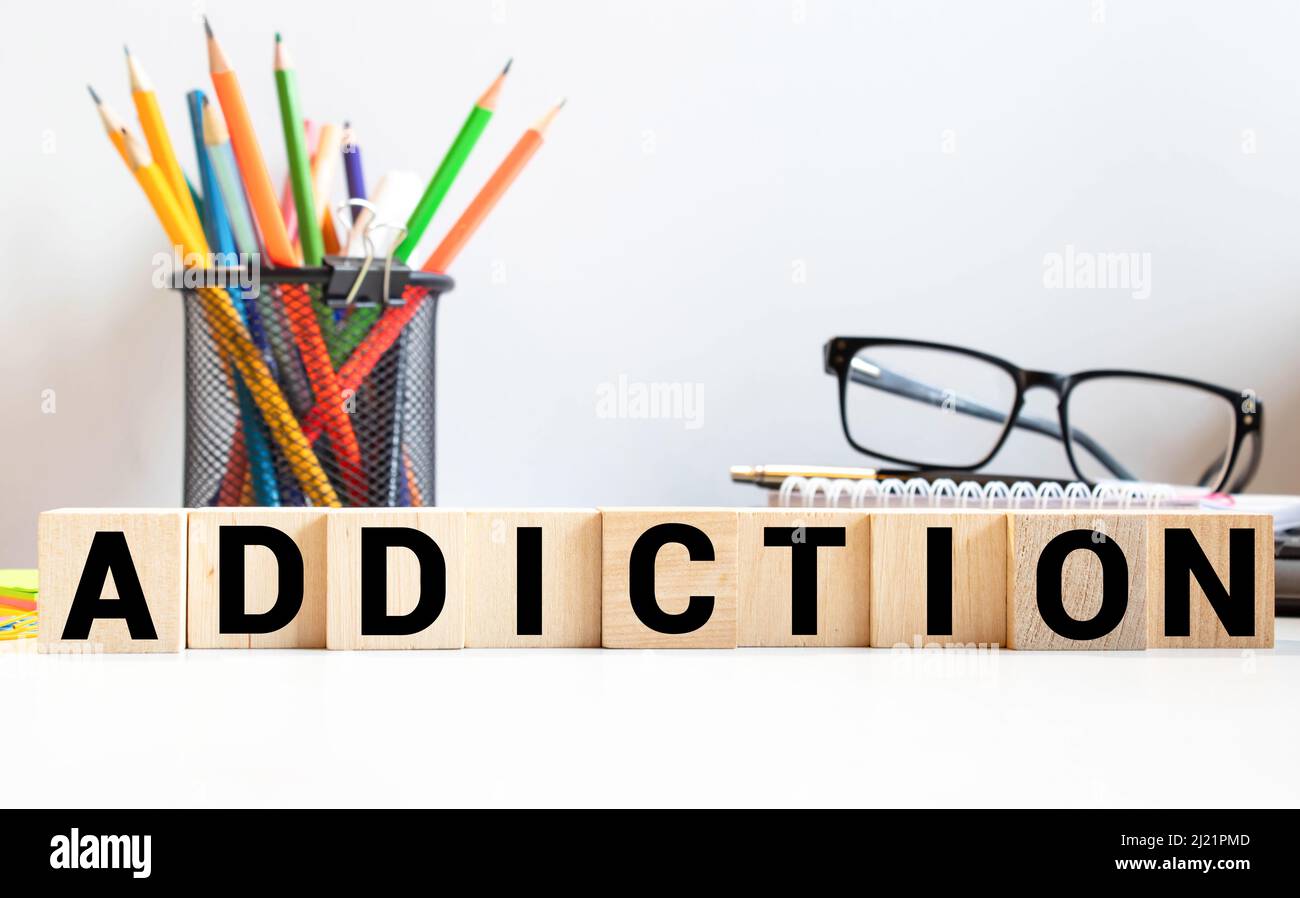 ADDICTION word made with building blocks, concept Stock Photo - Alamy