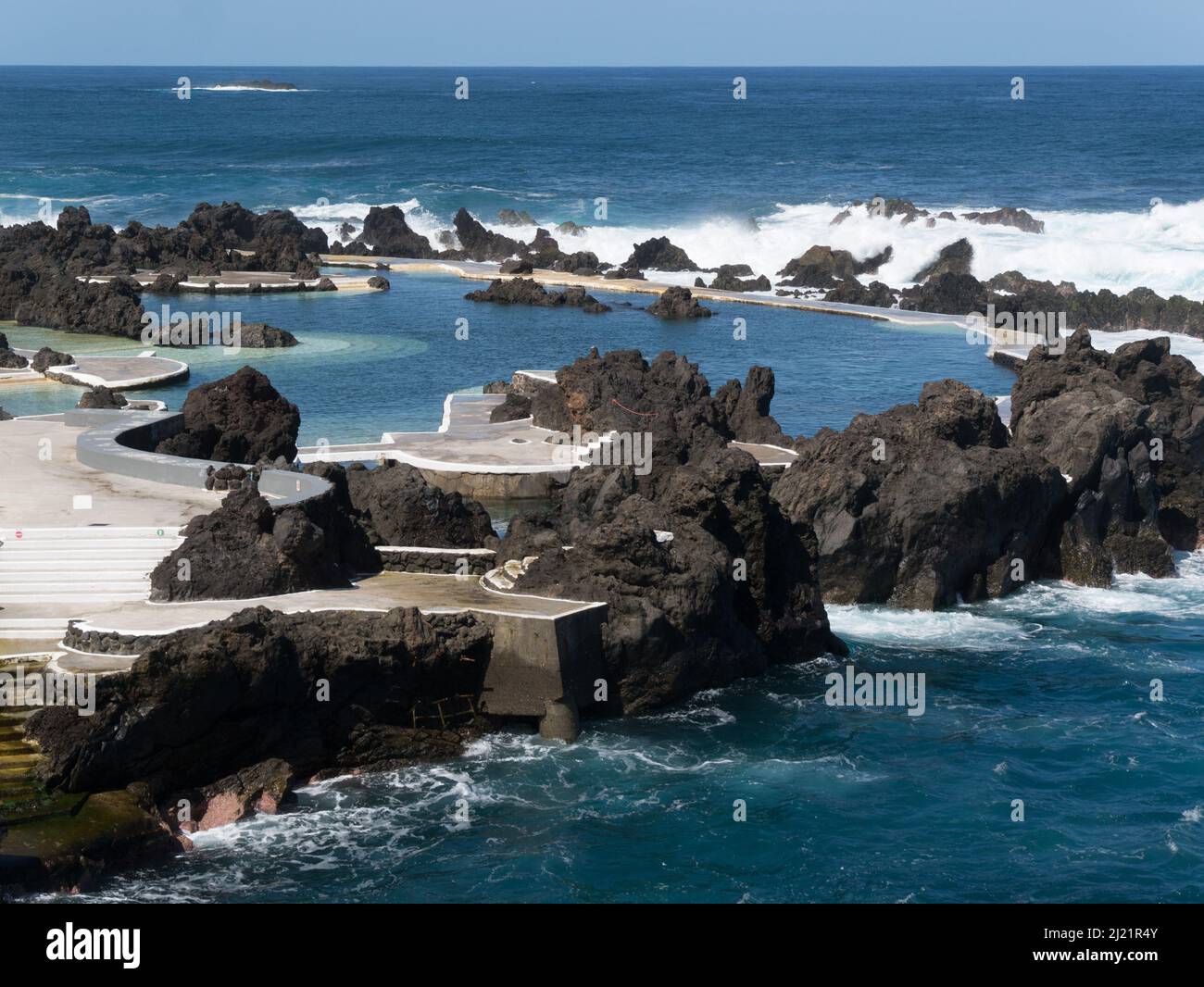 Natural lava swimming pools refreshed by Atlantic waves Porto Moniz Madeira Portugal EU Stock ...