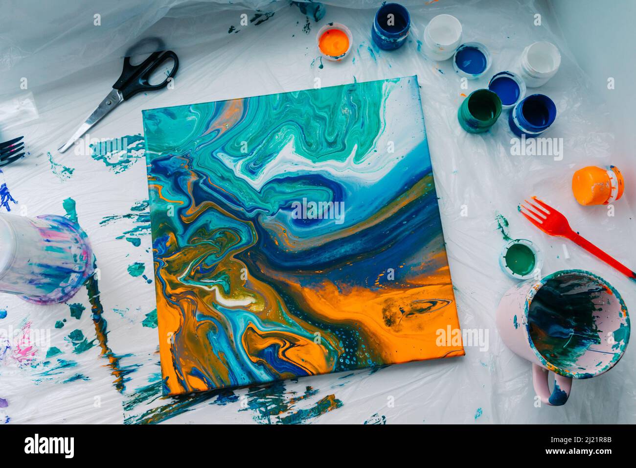Creation process of fluid art. Liquid acrylic artwork with beautiful ...