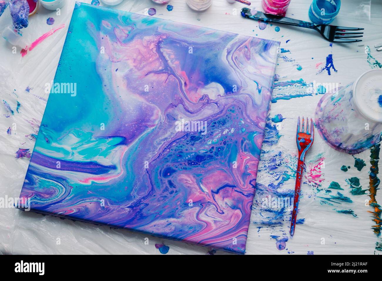 Creation process of fluid art. Liquid acrylic artwork with beautiful ...