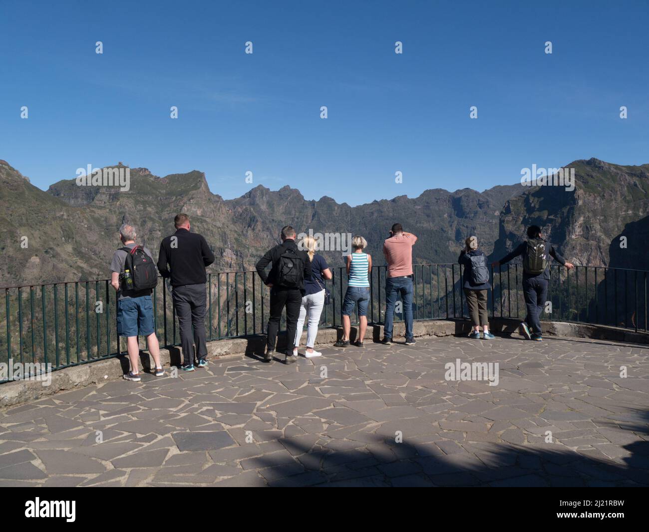 Tourists on viewing platform at Miradouro da Eira do Serrado looking ...