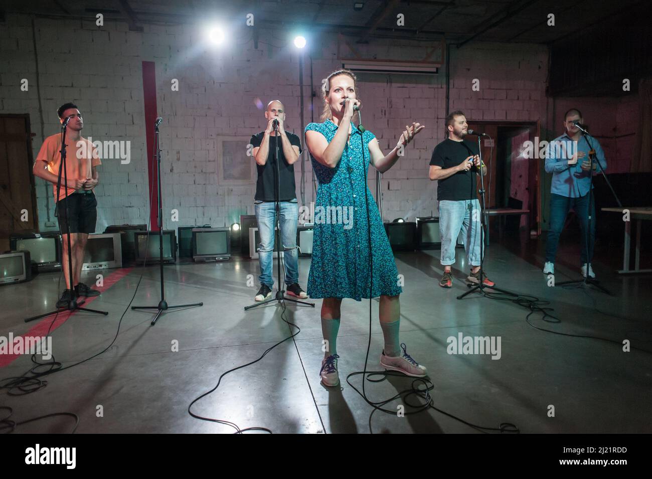 Behind the scenes. Rehearsal at theatre. Large group of actors ...