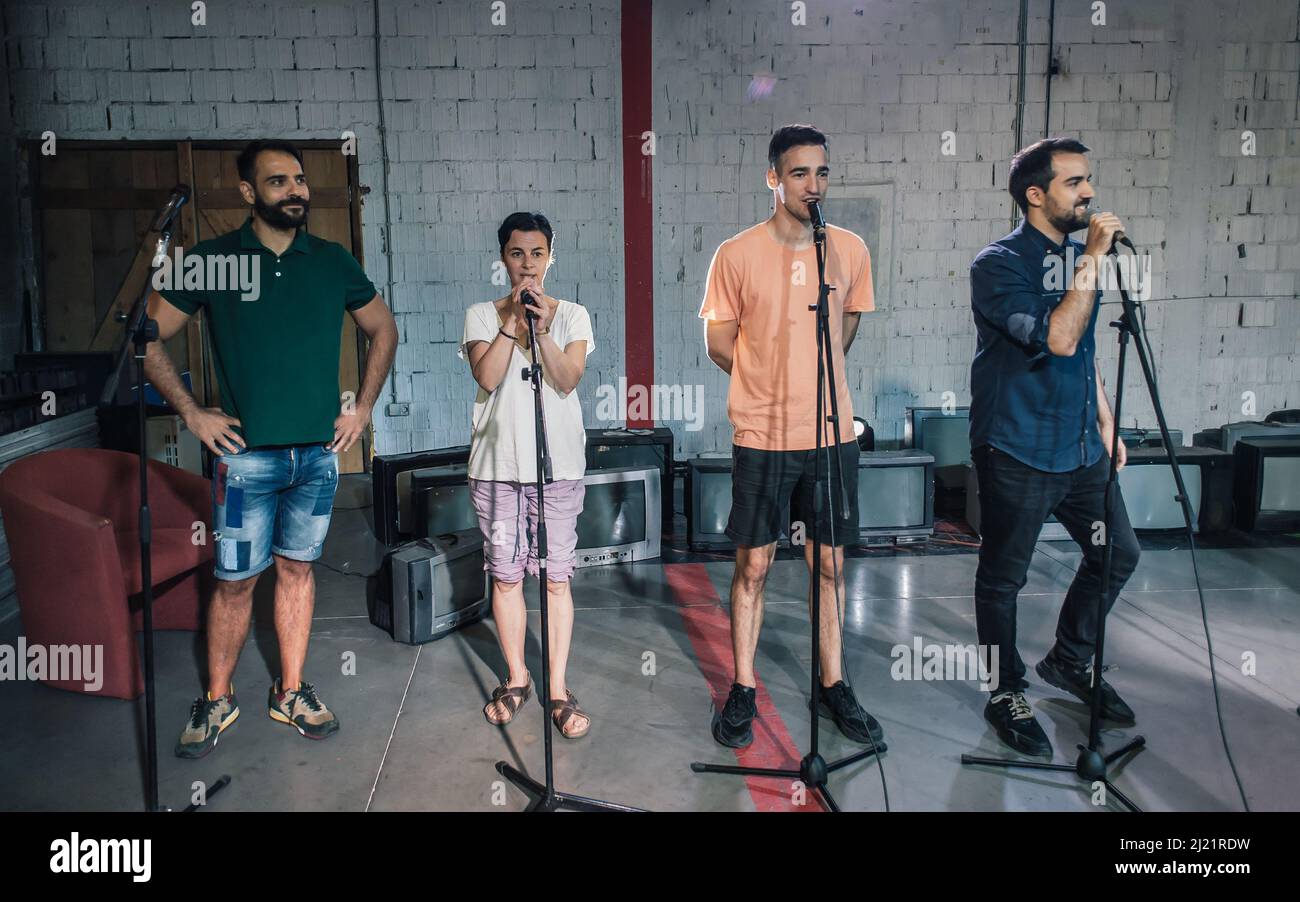 Behind the scenes. Rehearsal at theatre. Large group of actors ...