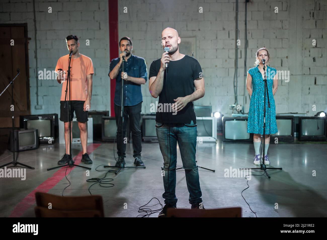Behind the scenes. Rehearsal at theatre. Large group of actors ...
