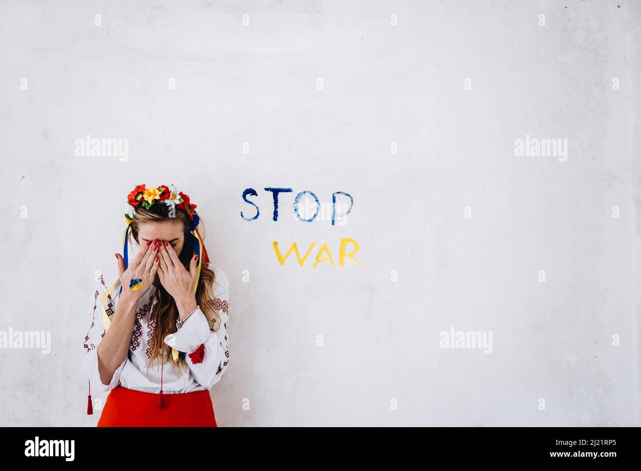 Ukrainian girl sad crying war in Ukraine. Stop war Stock Photo - Alamy