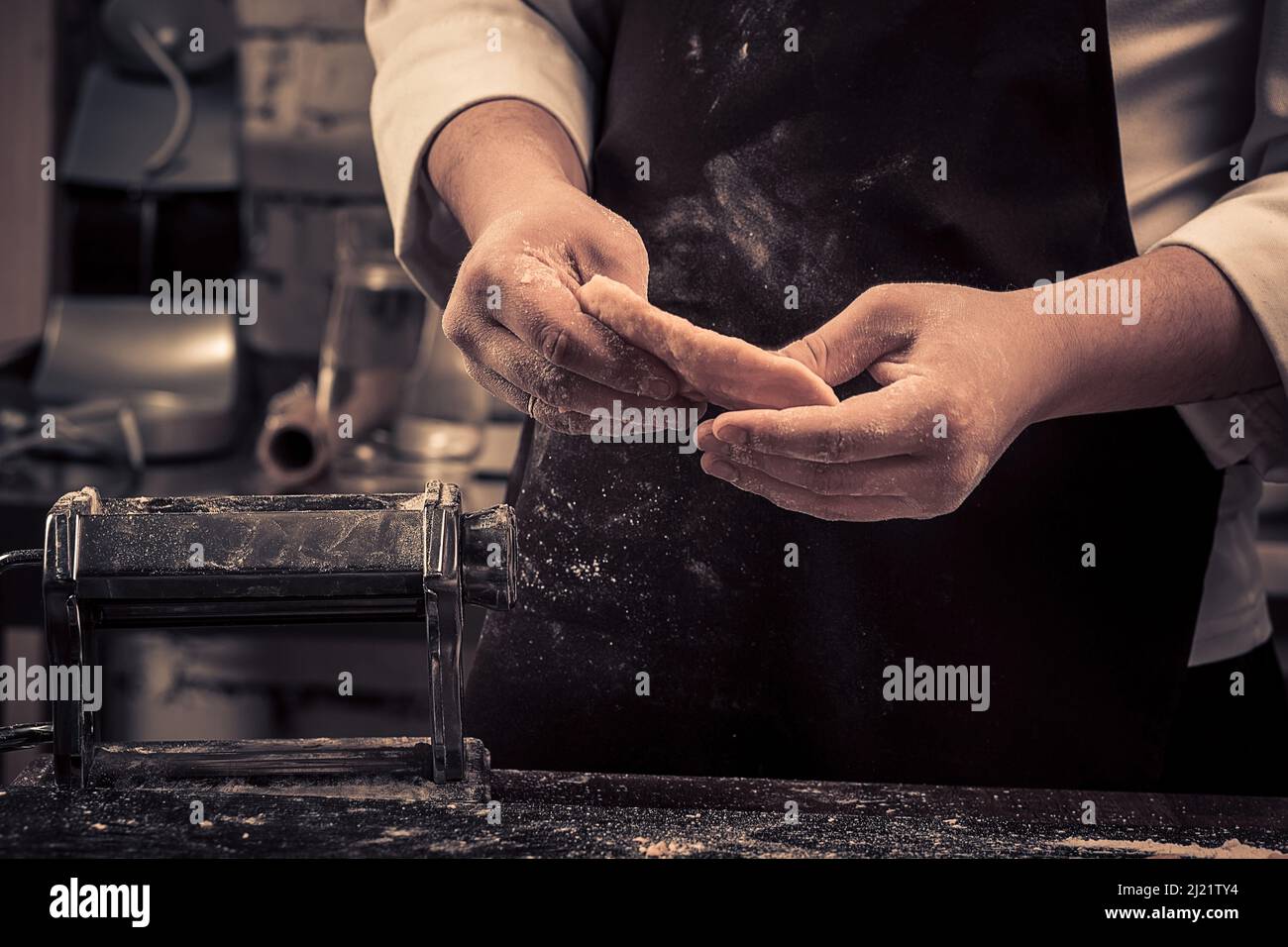The chef makes fresh pasta from scratch Stock Photo - Alamy