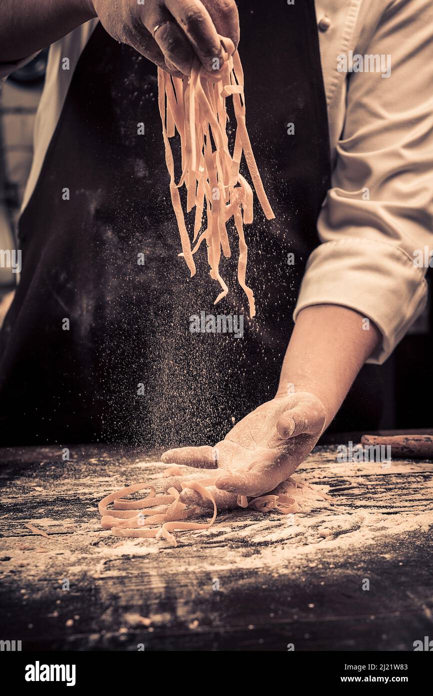 The chef makes fresh spaghetti from scratch Stock Photo - Alamy