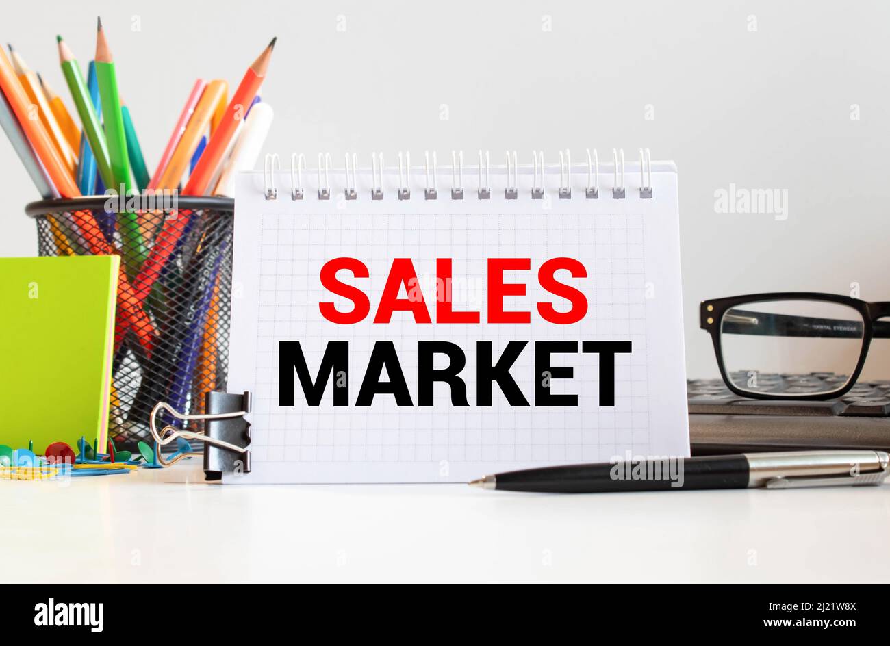 sales market word written on white paper Stock Photo - Alamy