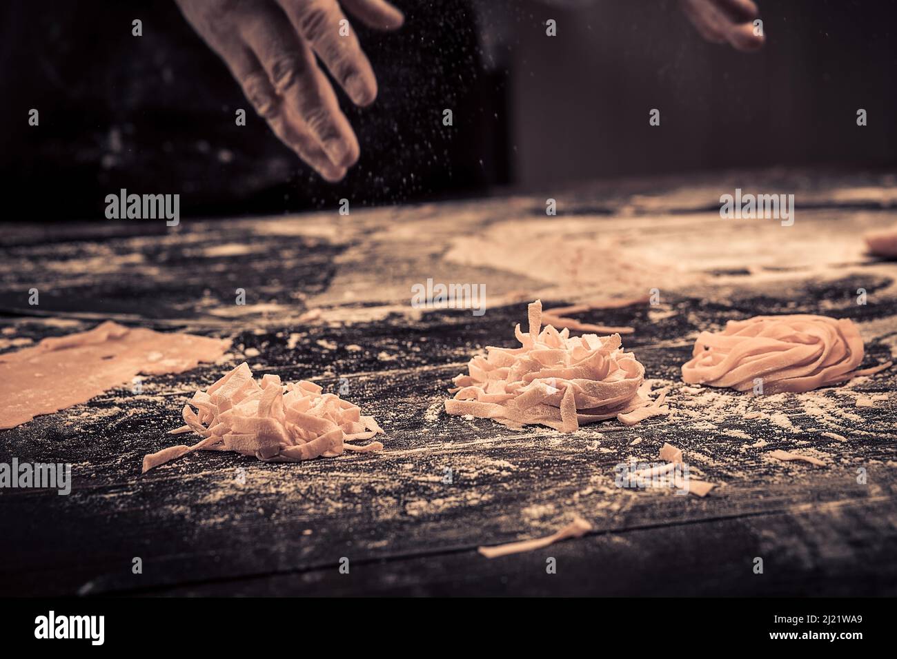 The chef makes fresh spaghetti from scratch Stock Photo - Alamy
