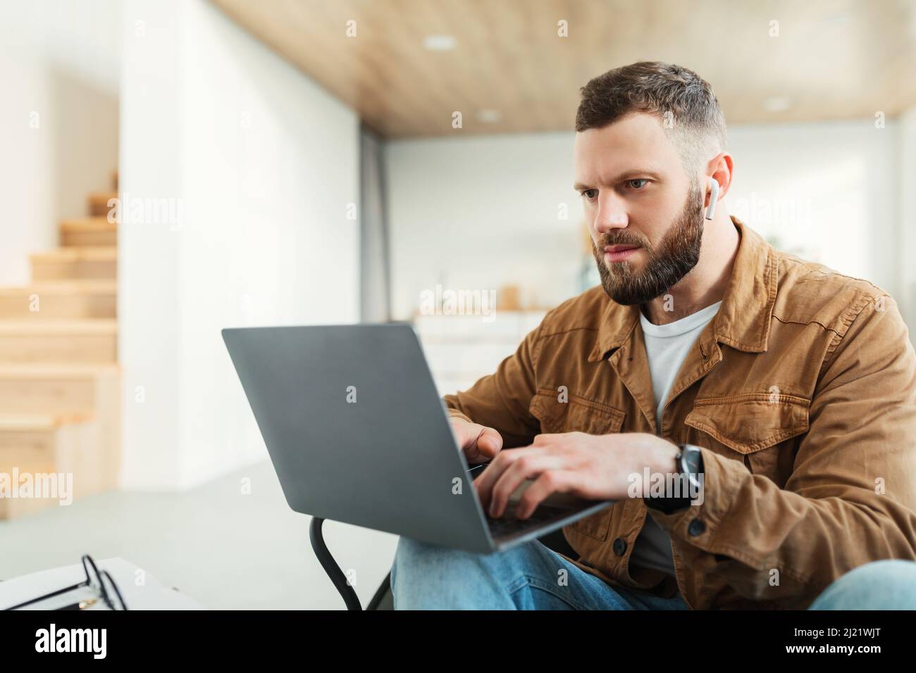 Young freelancer wearing wireless hi-res stock photography and images ...
