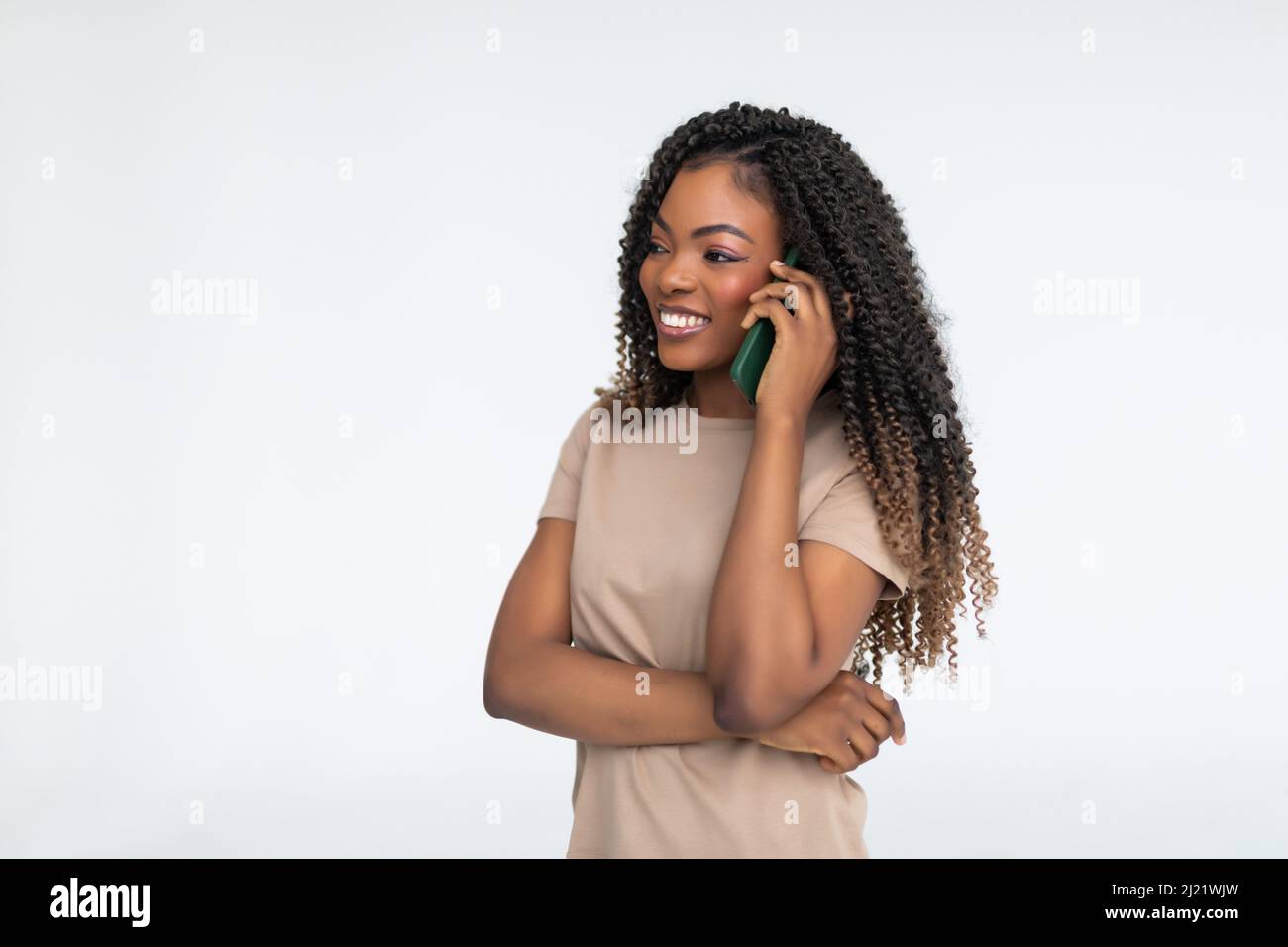 Happy black woman talking on hi-res stock photography and images - Alamy