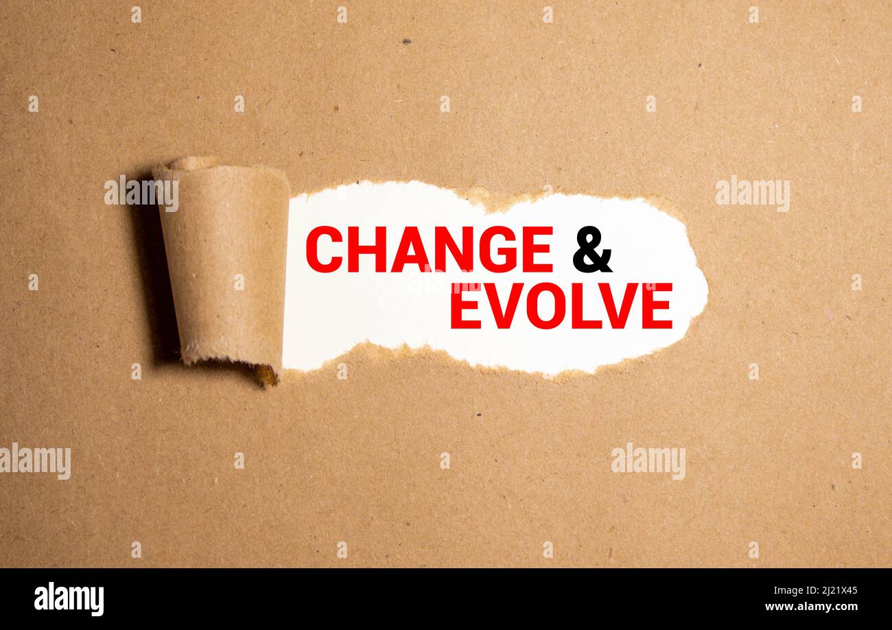 The text MAKE A CHANGE behind torn brown paper Stock Photo - Alamy