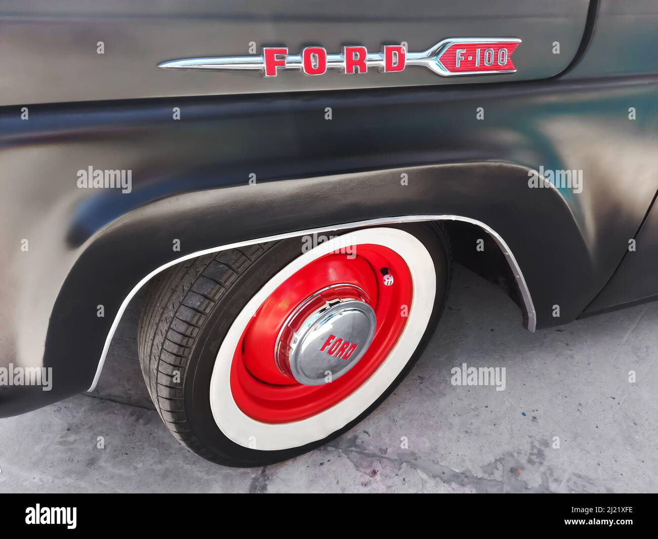 Ford F100 logo and branding on the hood side and on the wheel cup of an ...