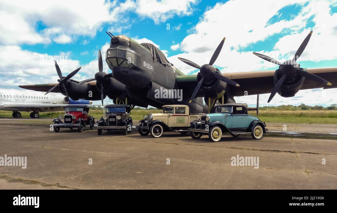 Several old Ford Model A in different body styles circa 1930 parked in ...