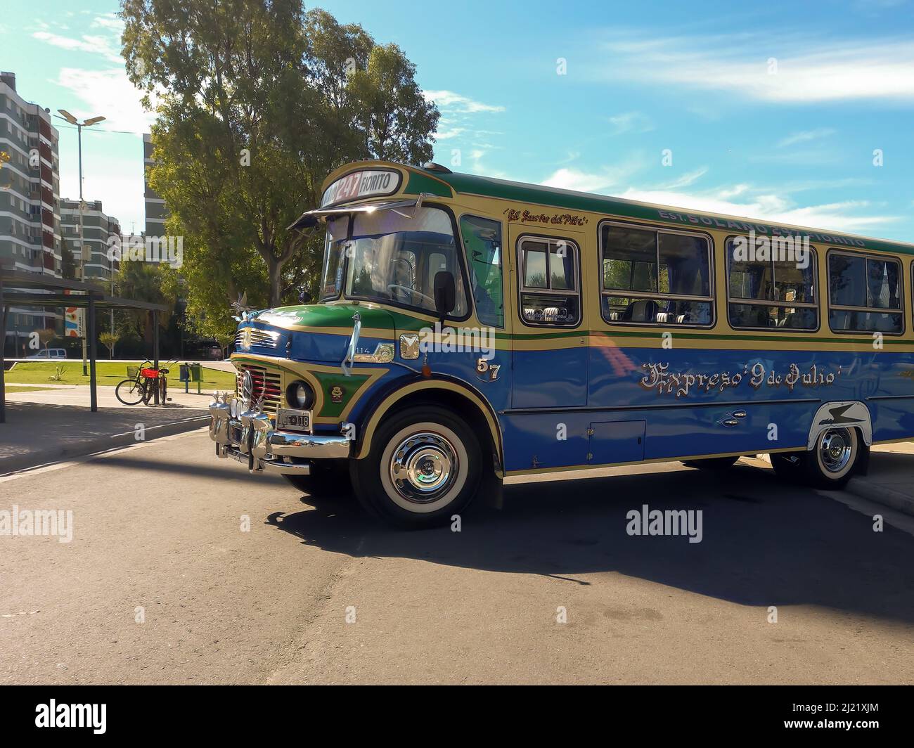 old blue Mercedes Benz 1114 bus in the street. Public passenger ...